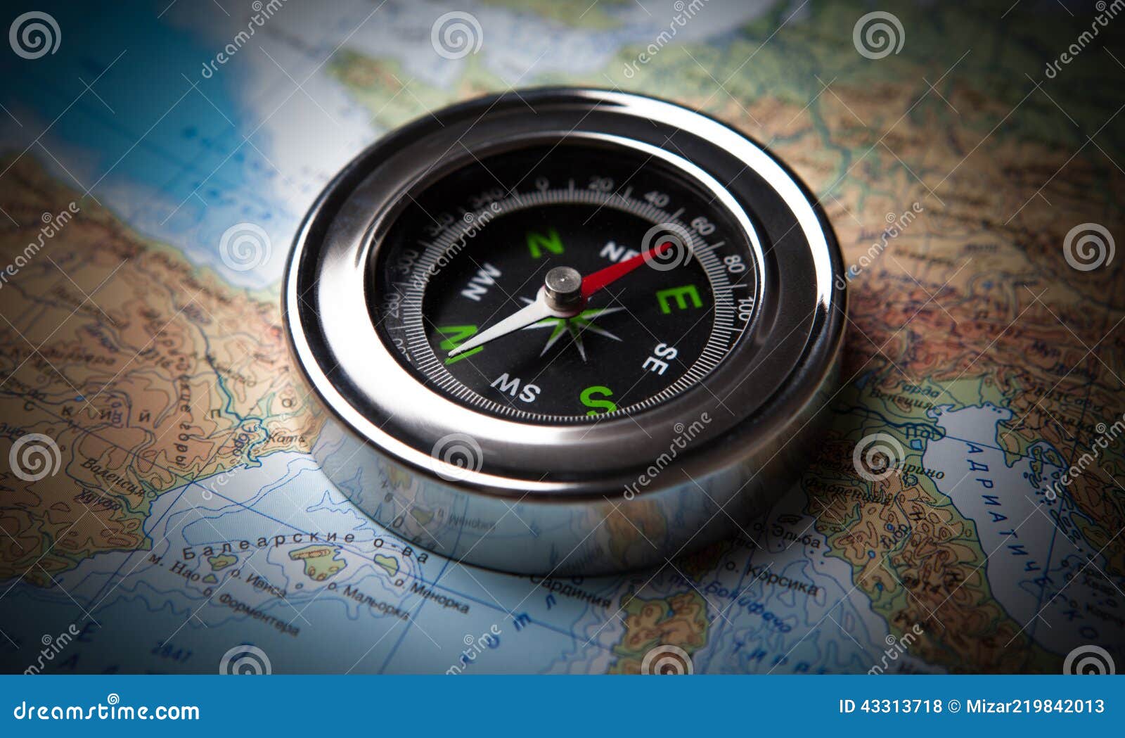 Tourist Compass Lying on a Map Stock Photo - Image of pole, compass ...