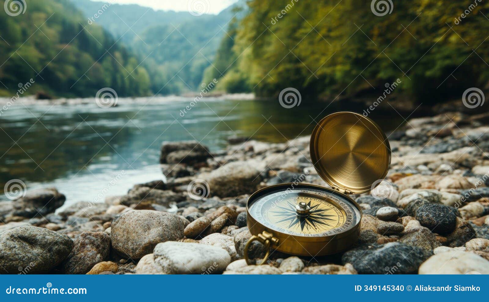 Tourist Compass Placed on a Rocky Surface by a Riverside Stock ...