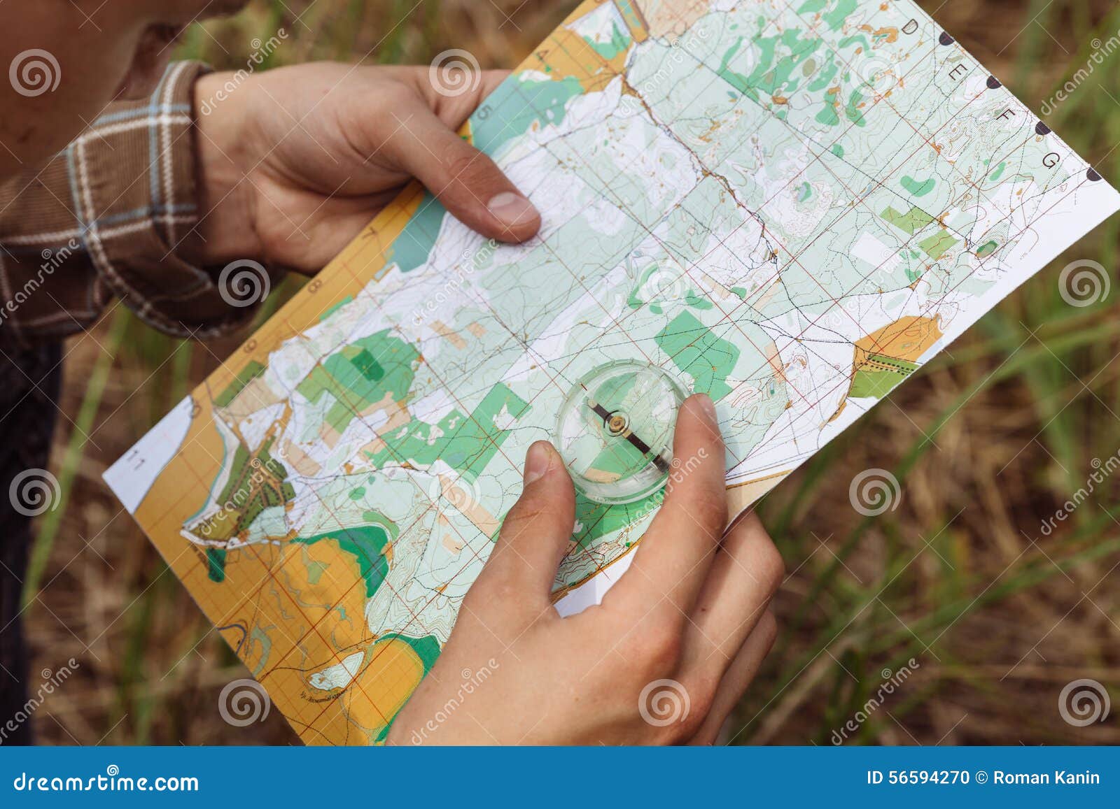 Tourist Determine the Route Map and Compass Stock Photo - Image of ...