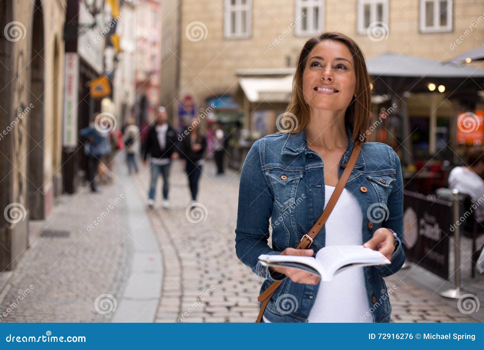 Tourist with guide book stock photo. Image of happiness - 72916276