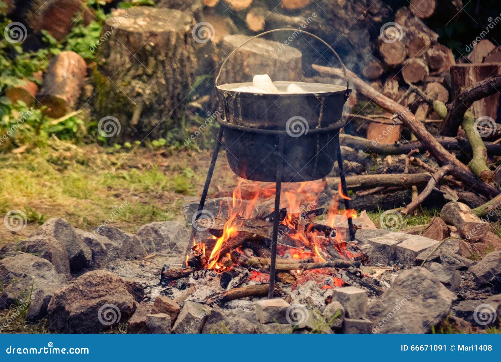 Tourist Kettle of Boiling Food Over a Campfire Stock Image - Image of ...