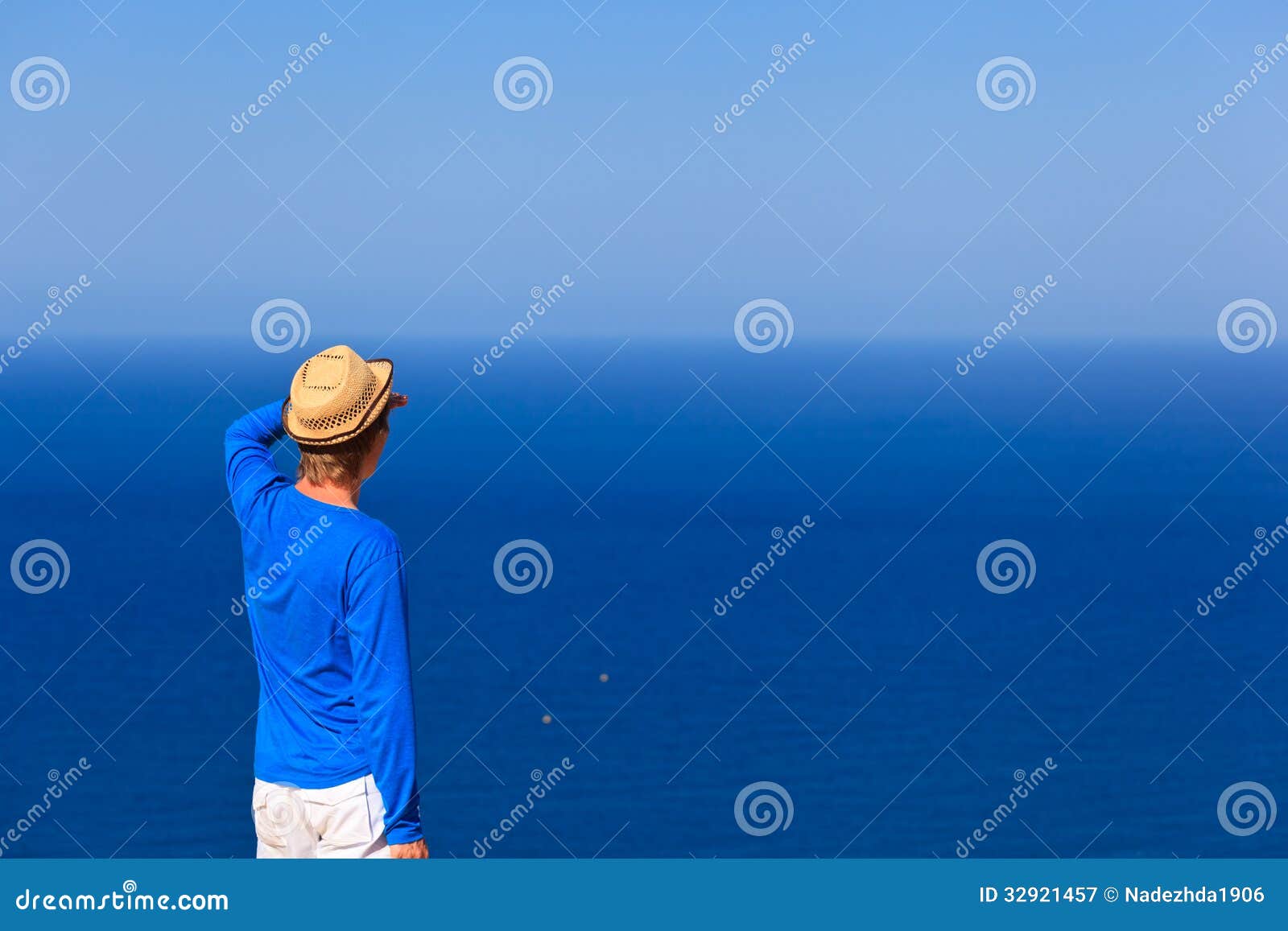 Tourist looking at the sea stock image. Image of person - 32921457