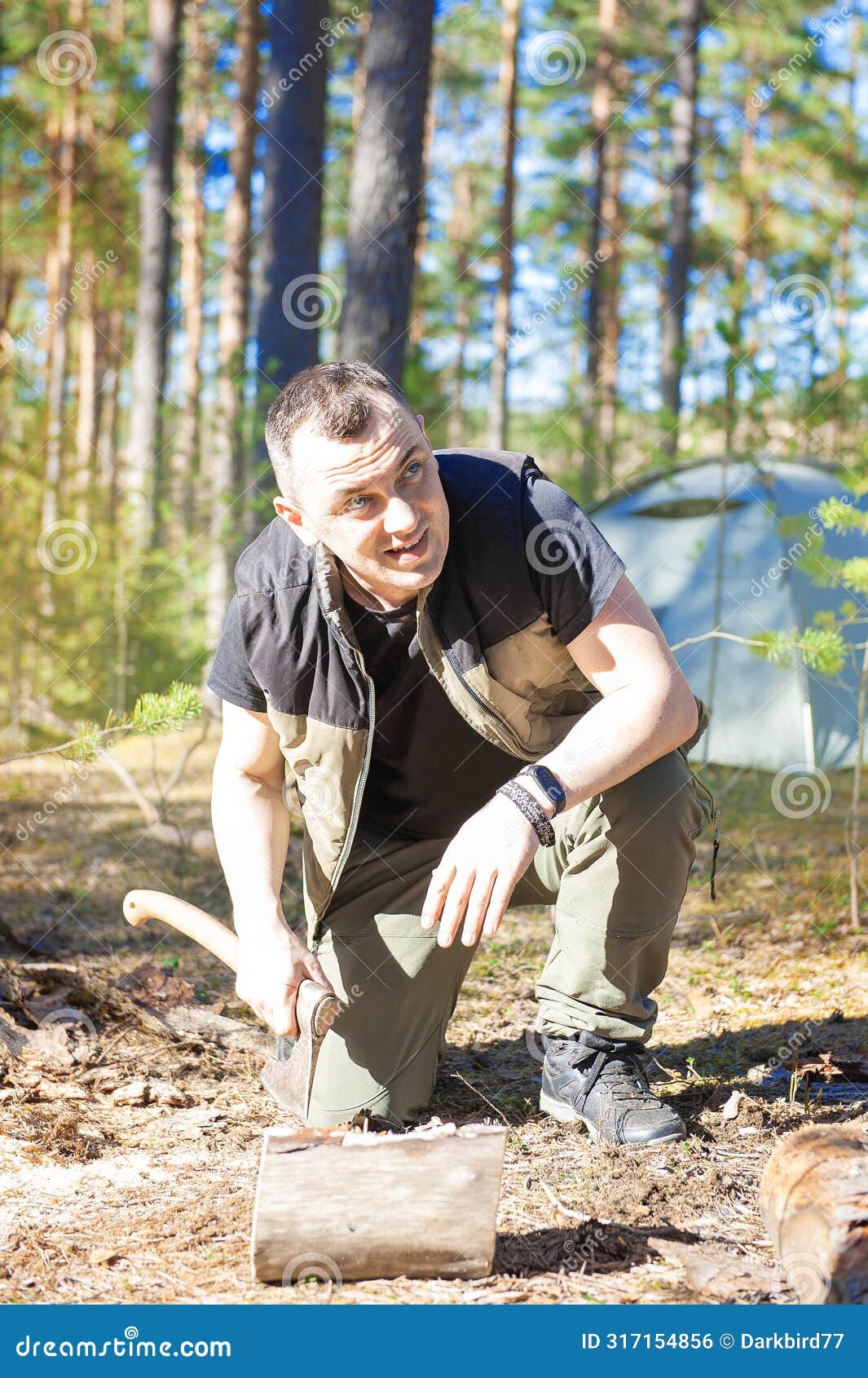 Tourist Man Chops Tree in Forest with Sharp Ax Stock Photo - Image of ...