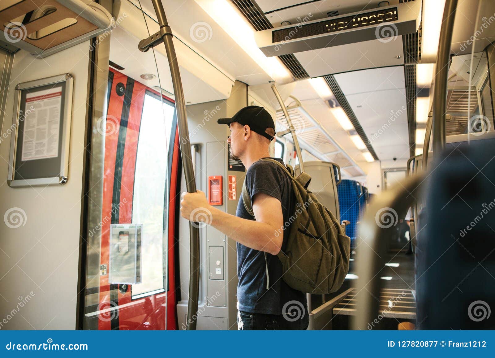 Tourist Man or Student with a Backpack Waiting for the Train To Stop ...