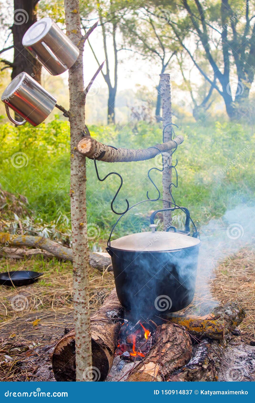 Tourist pot over camp fire stock image. Image of bonfire - 150914837