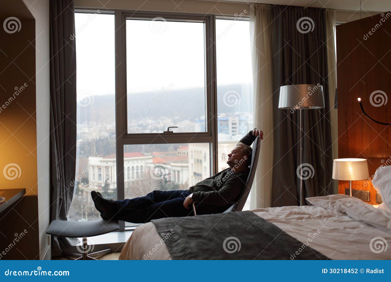 Tourist in hotel room stock photo. Image of horizontal - 30218452