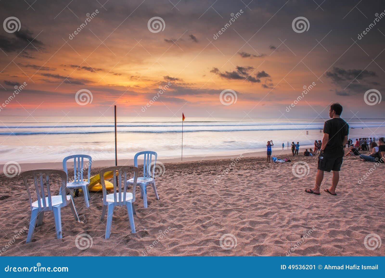 Tourist Viewing Sunset at Kuta Beach, Bali. Editorial Photo - Image of ...