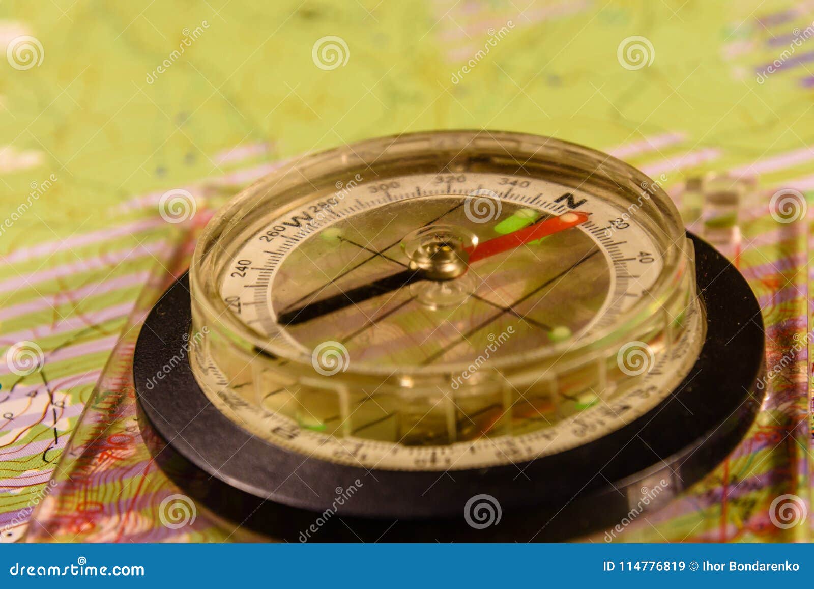 Magnetic Compass Lying on Topographical Map Stock Image - Image of ...