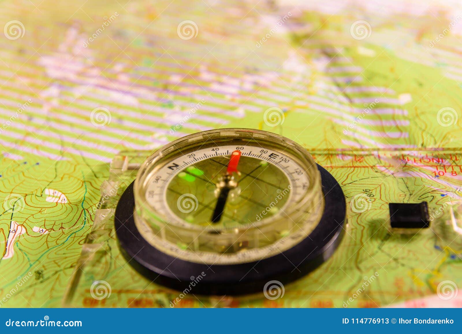 Magnetic Compass Lying on Topographical Map Stock Image - Image of ...