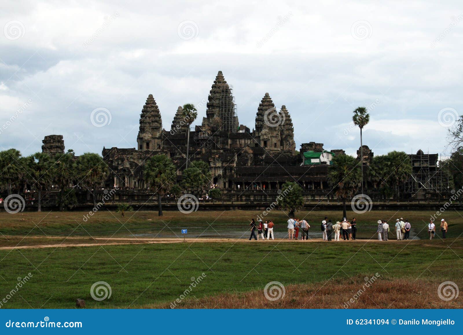 Tourists in angkor wat editorial stock image. Image of unesco - 62341094