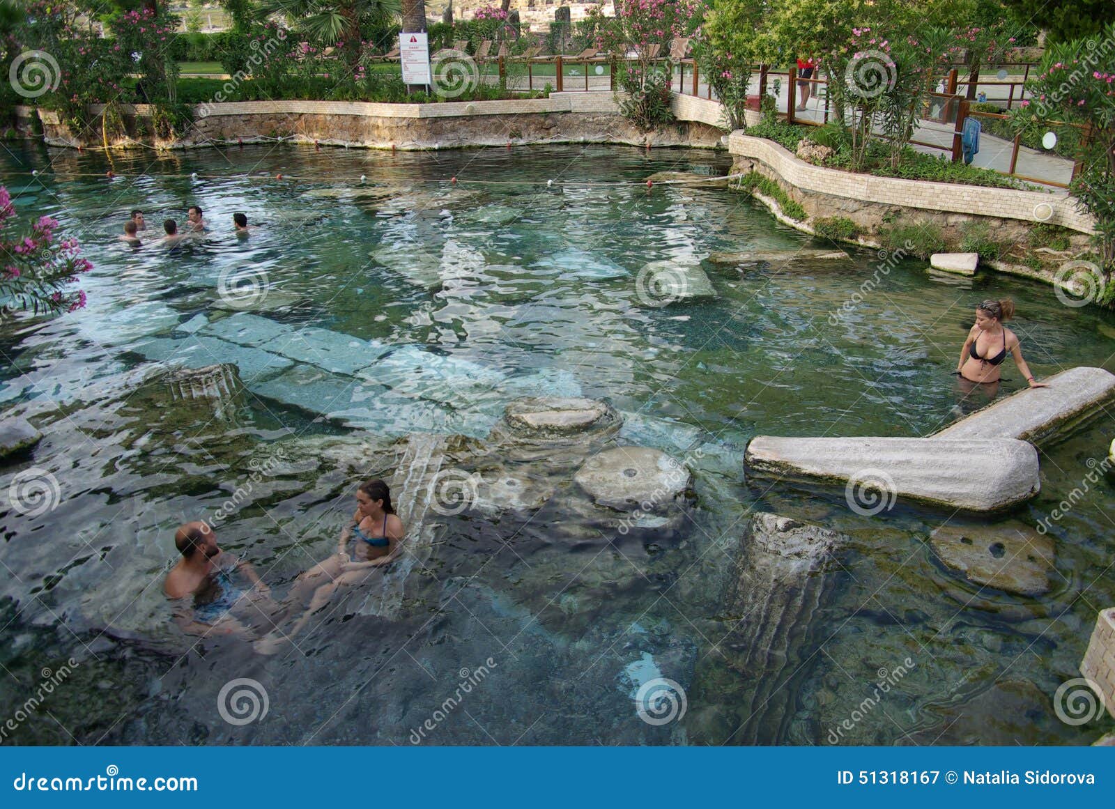 Tourists Bathing in the Pool of Cleopatra in Pamukkale, Turkey ...