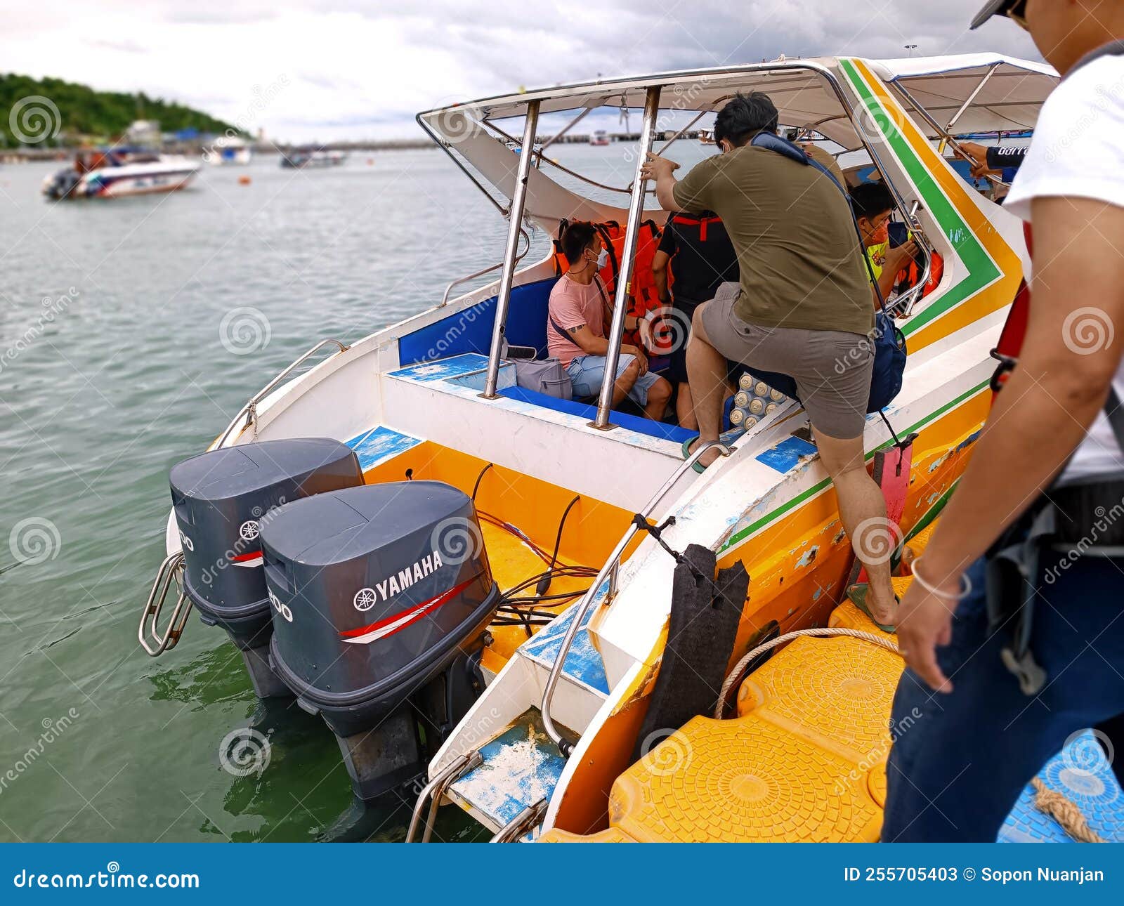 Tourists Board a Speedboat at the Floating Capital Pier . Editorial ...