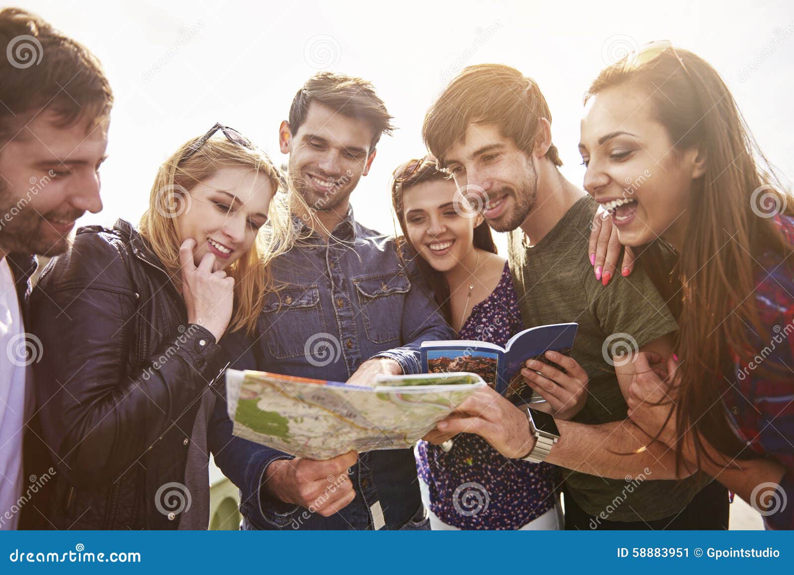 Tourists checking the map stock image. Image of direction - 58883951