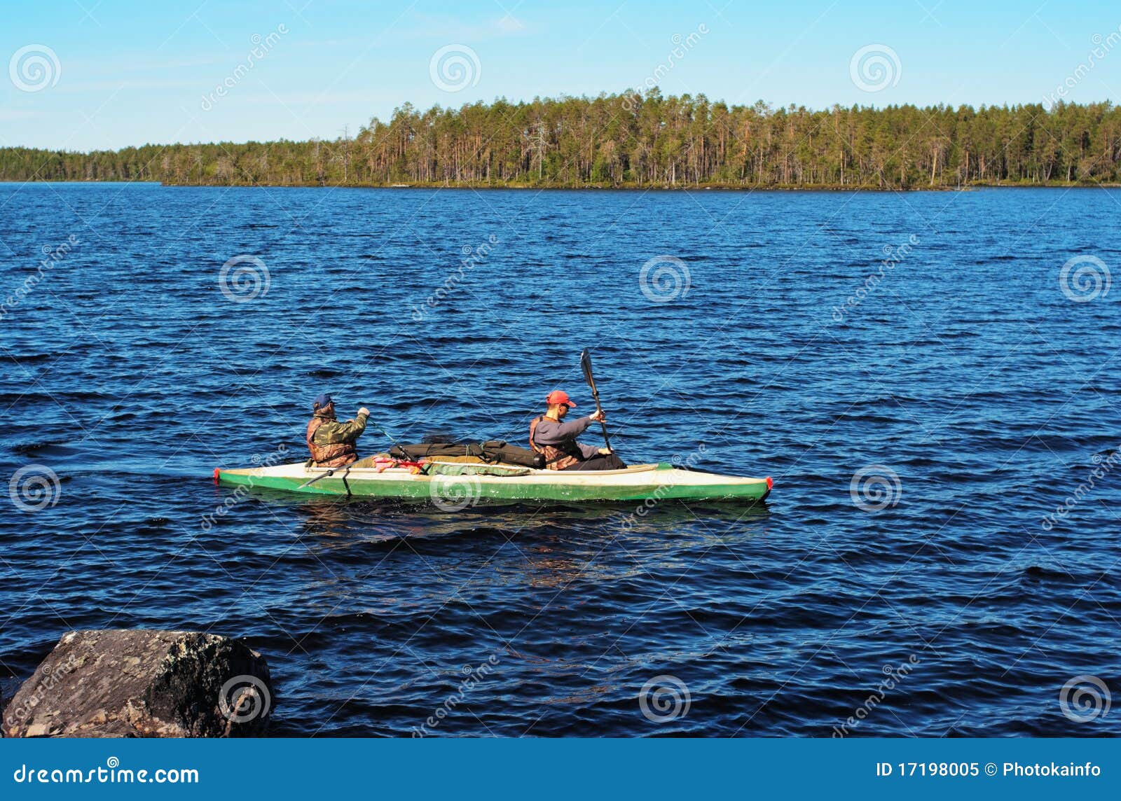 Tourists float on a canoe stock image. Image of grey - 17198005