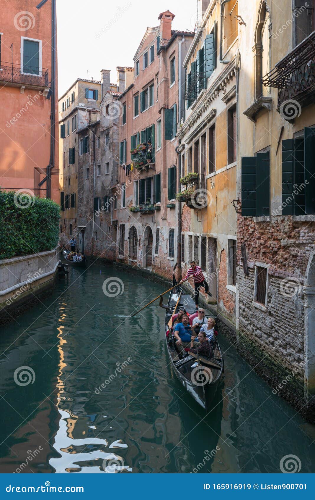 Tourists On Gondola On The Canals Of Venice Italy Editorial Stock