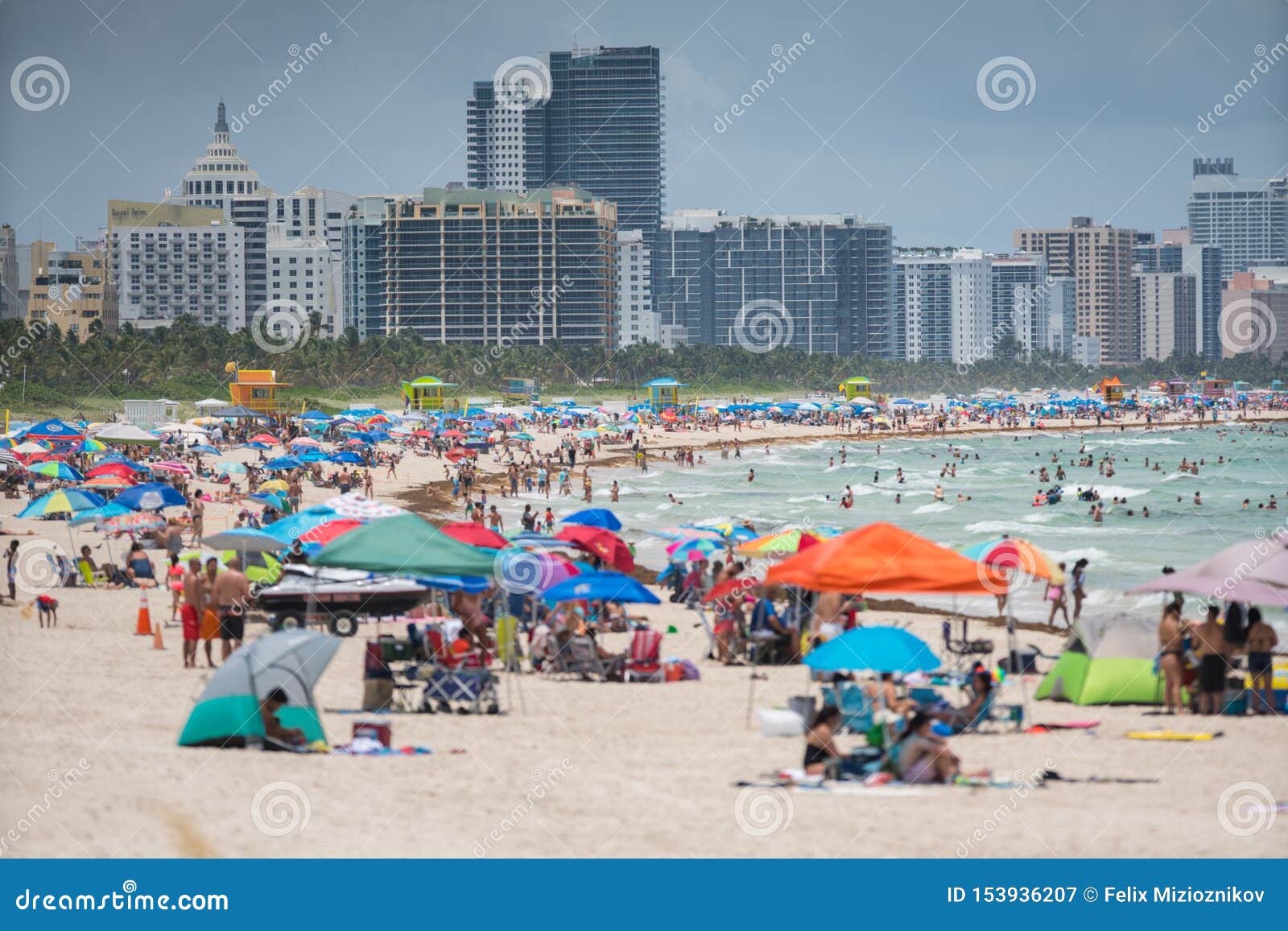 Tourists on Miami Beach. Getting Ready for a Day at the Beach Stock ...