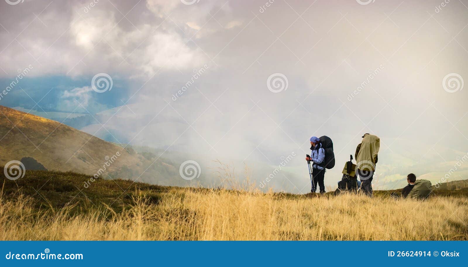 Tourists in the mountains stock photo. Image of high - 26624914
