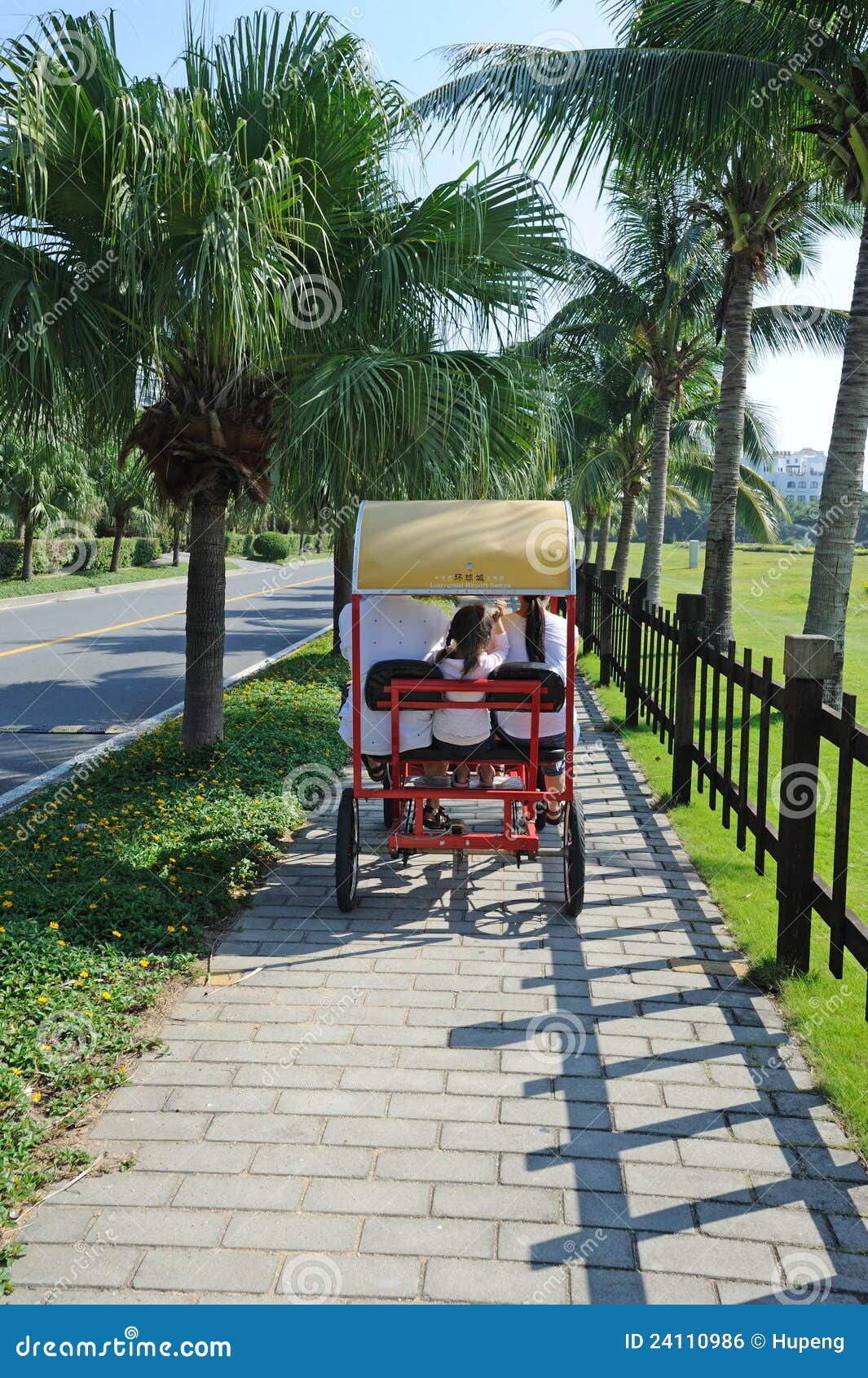 Tourists Riding a tricycle editorial photo. Image of cycle - 24110986