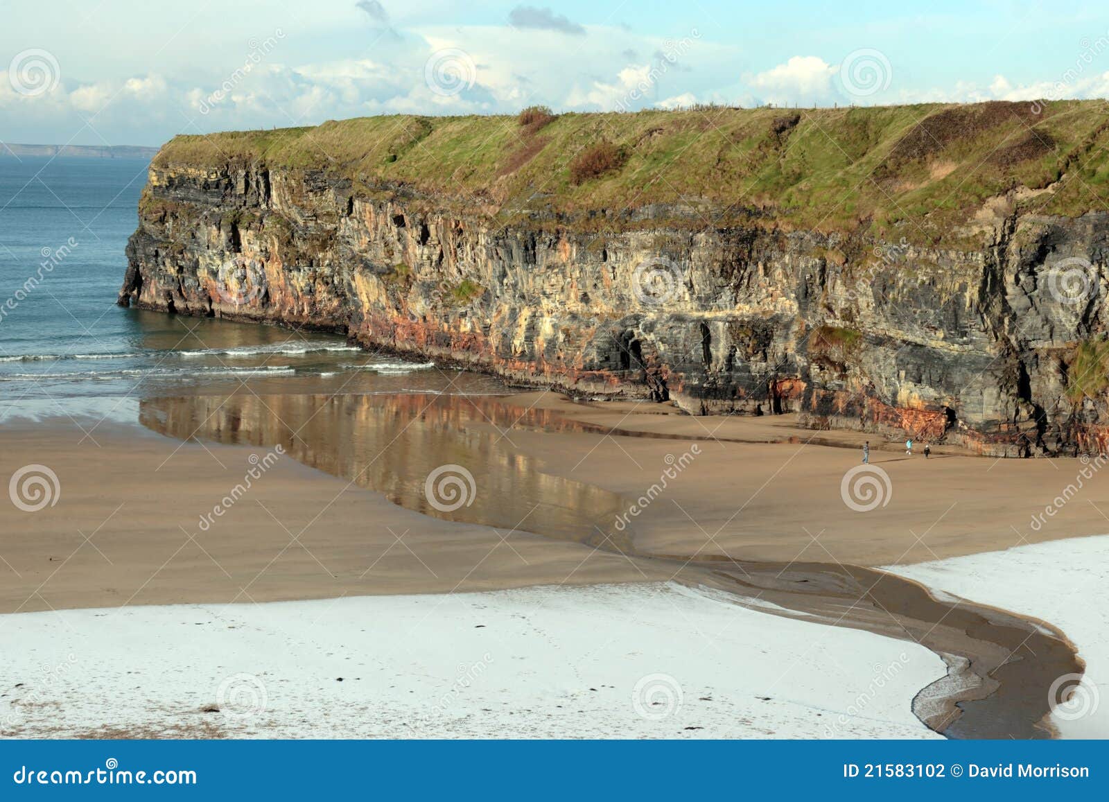 Tourists on Rocky Icy Beach on a Cold Winters Day Stock Photo - Image ...