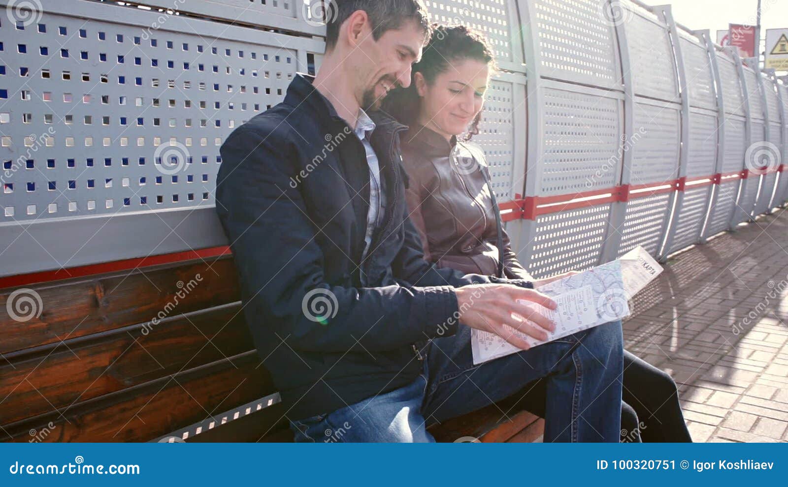 Tourists Study Map and Wait for Train Stock Video - Video of portrait ...