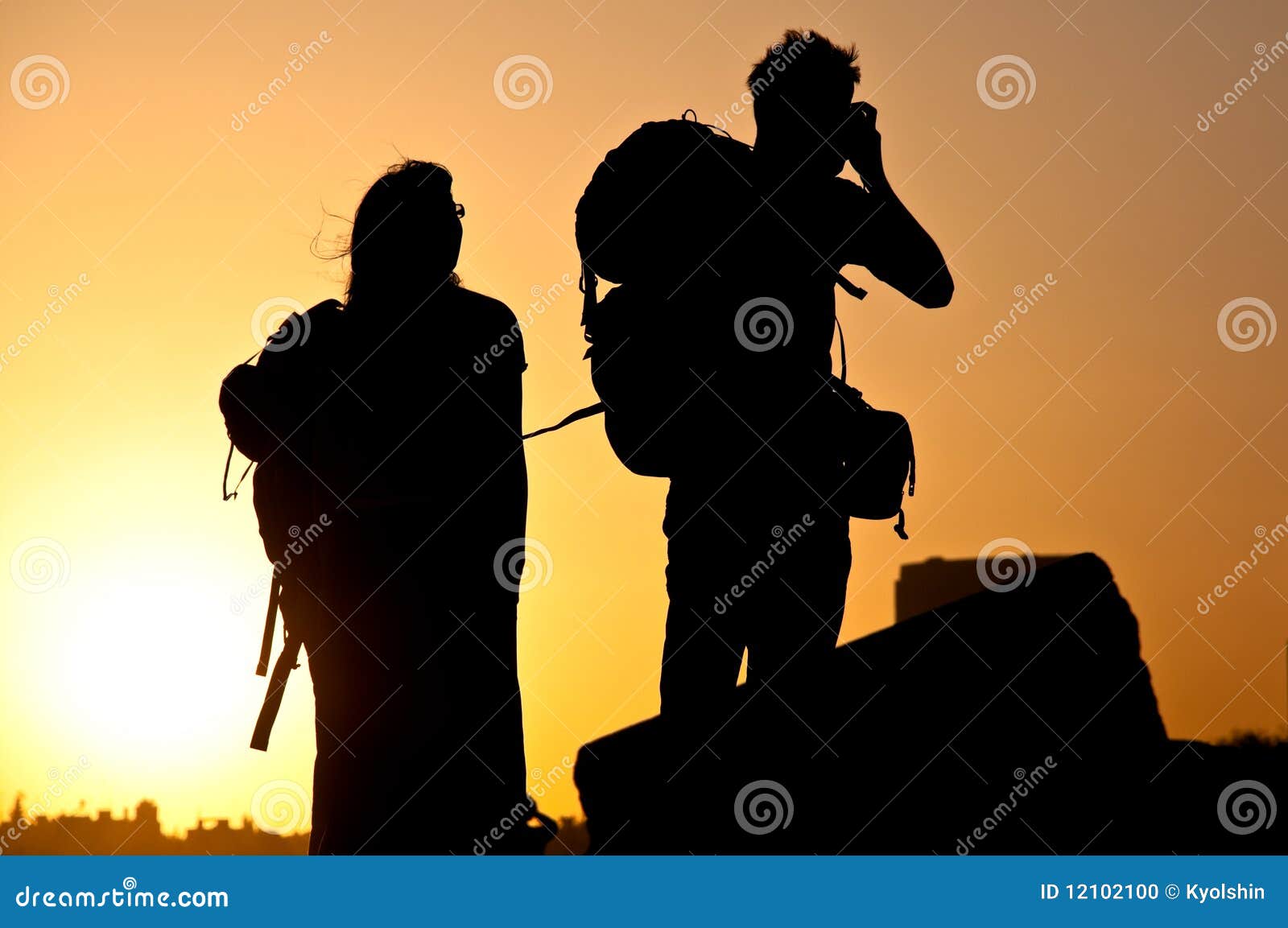 Tourists at sunset stock photo. Image of active, colorful - 12102100