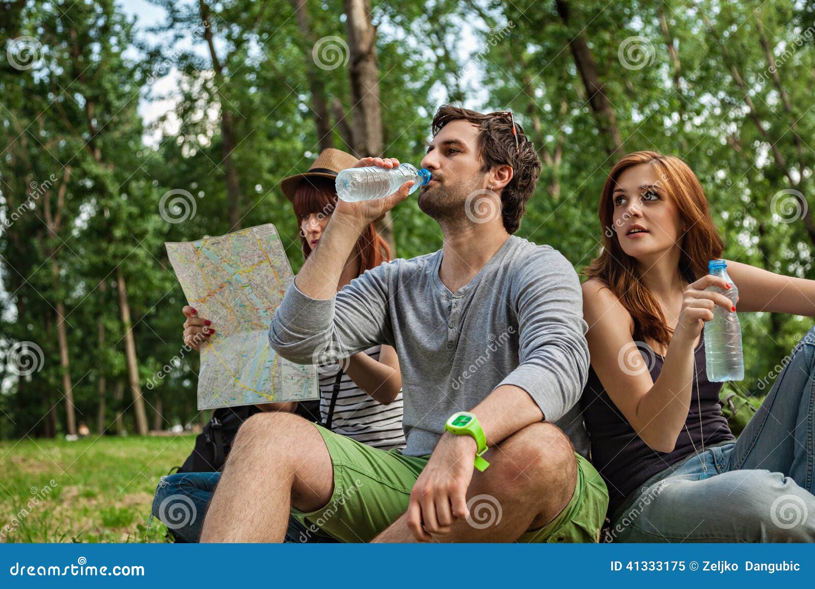 Tourists Taking a Rest stock image. Image of examining - 41333175