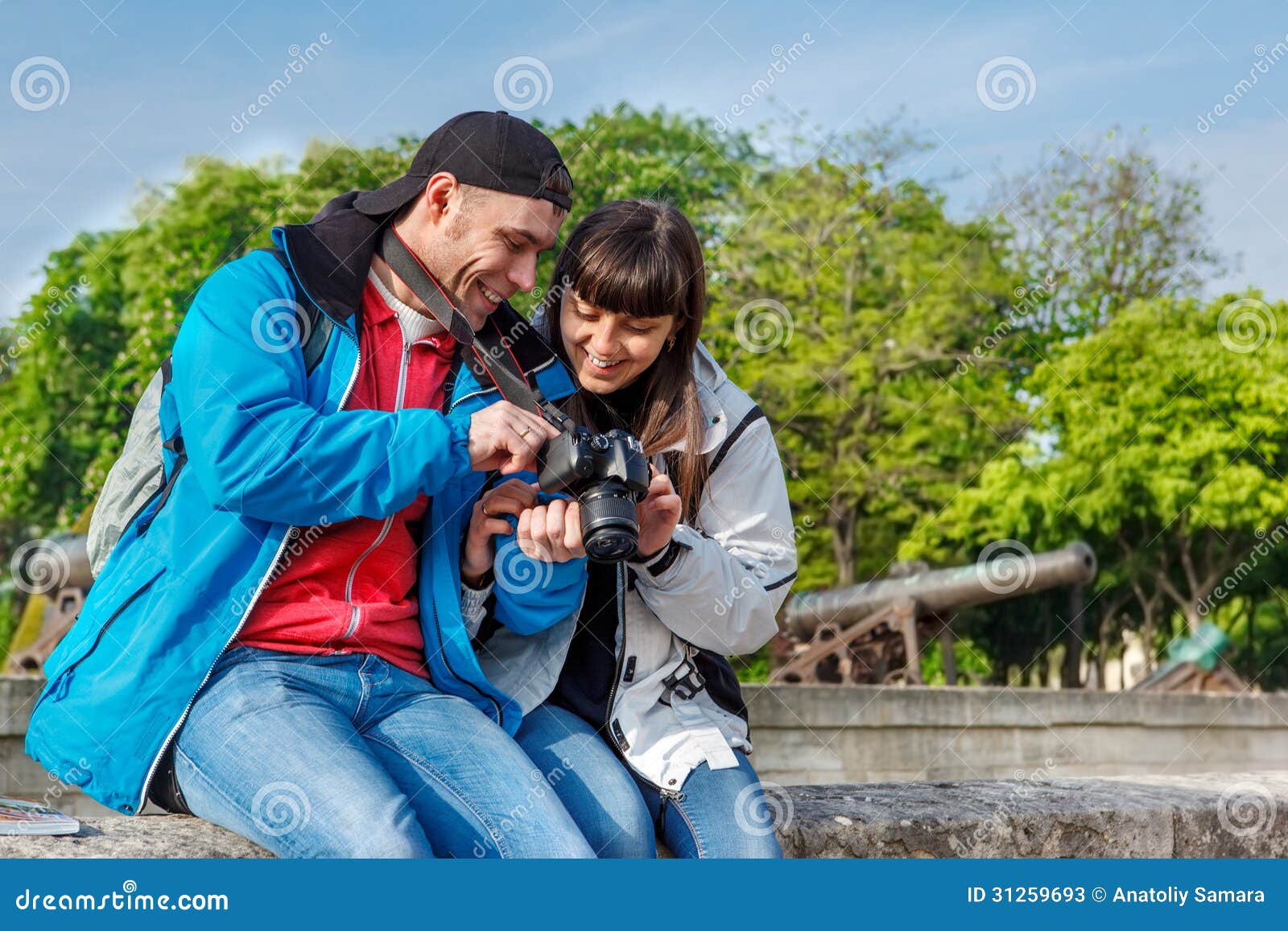 Tourists viewing photos stock image. Image of human, together - 31259693