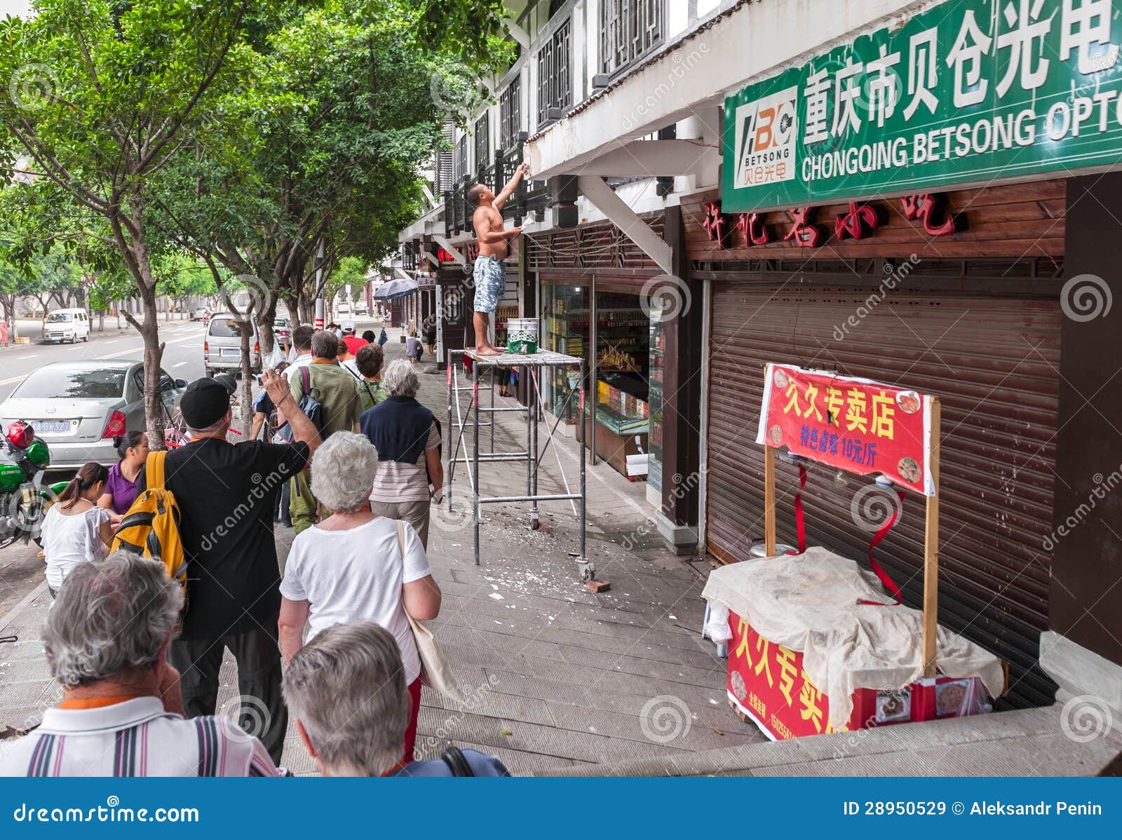 Tourists Walk Along the Sidewalk Editorial Stock Image - Image of ...
