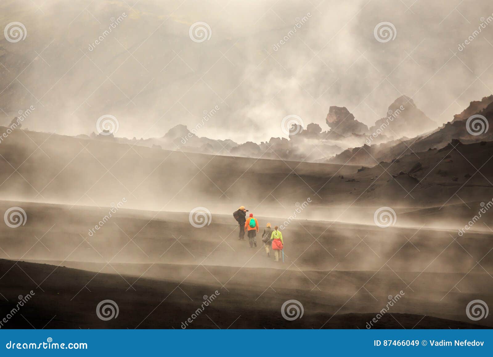 Tourists Walking among Steaming Lava Fields with Volcano Slope ...