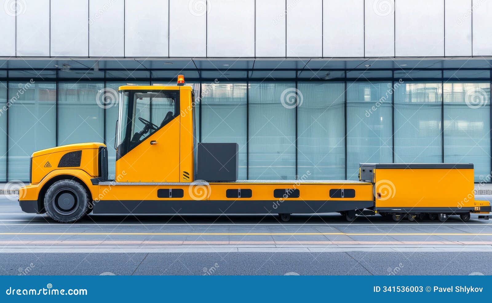 Tow Tractor Pulling Luggage Carts at Airport Apron Stock Image - Image ...