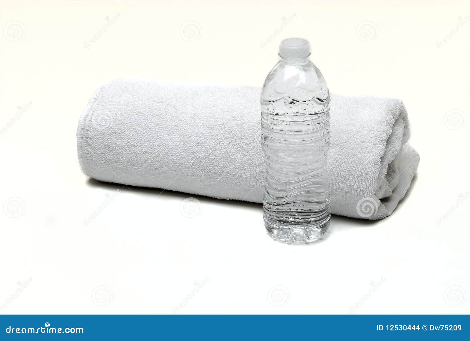 Towel with Bottled Water stock photo. Image of fitness - 12530444