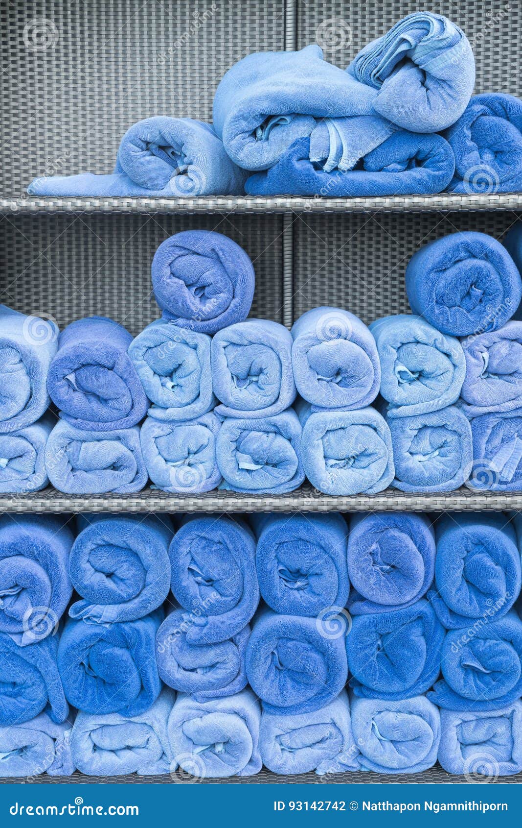 Towel roll stack on shelf stock photo. Image of bath - 93142742