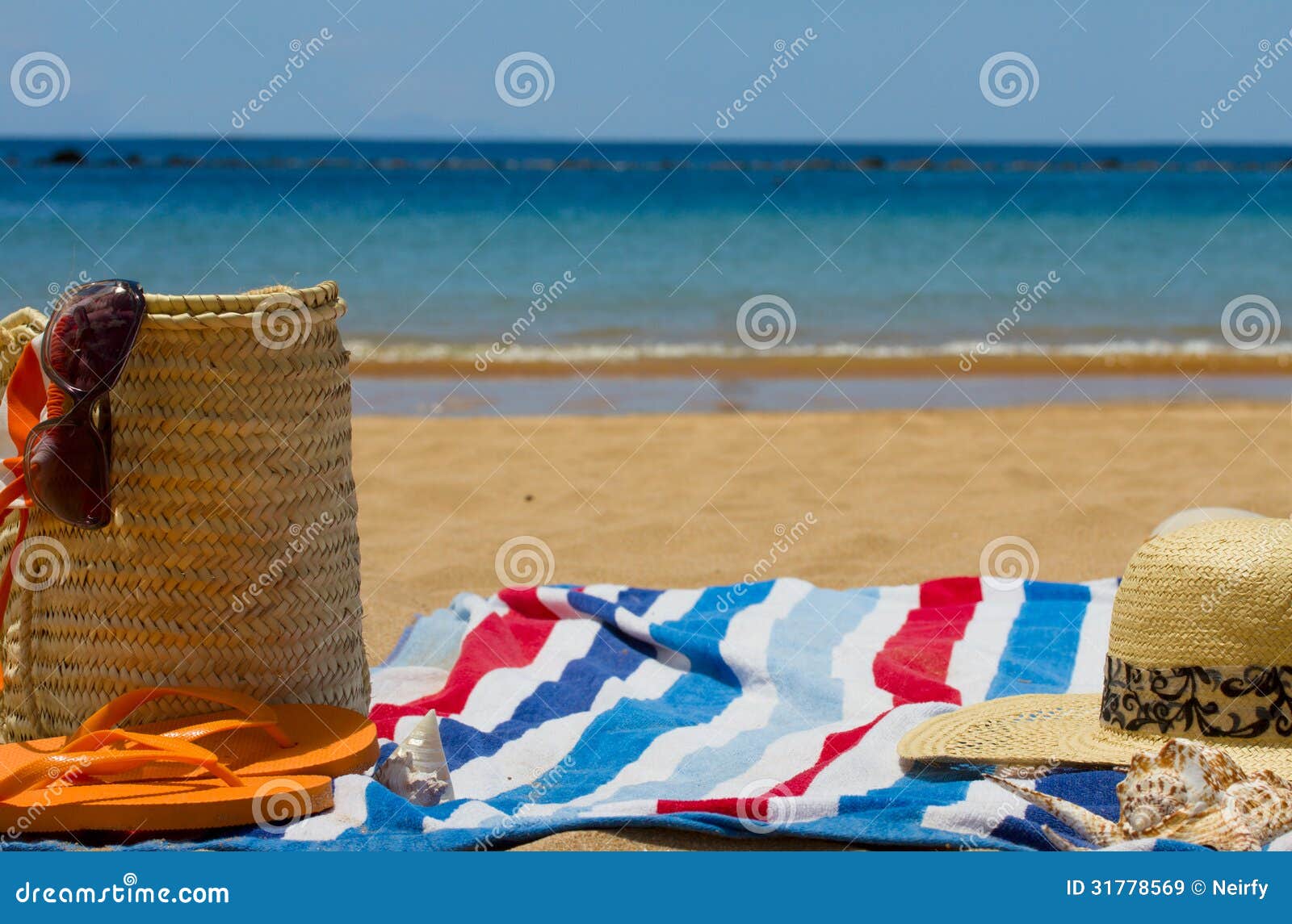 Towel and Sunbathing Accessories on Bech Stock Image - Image of shore ...