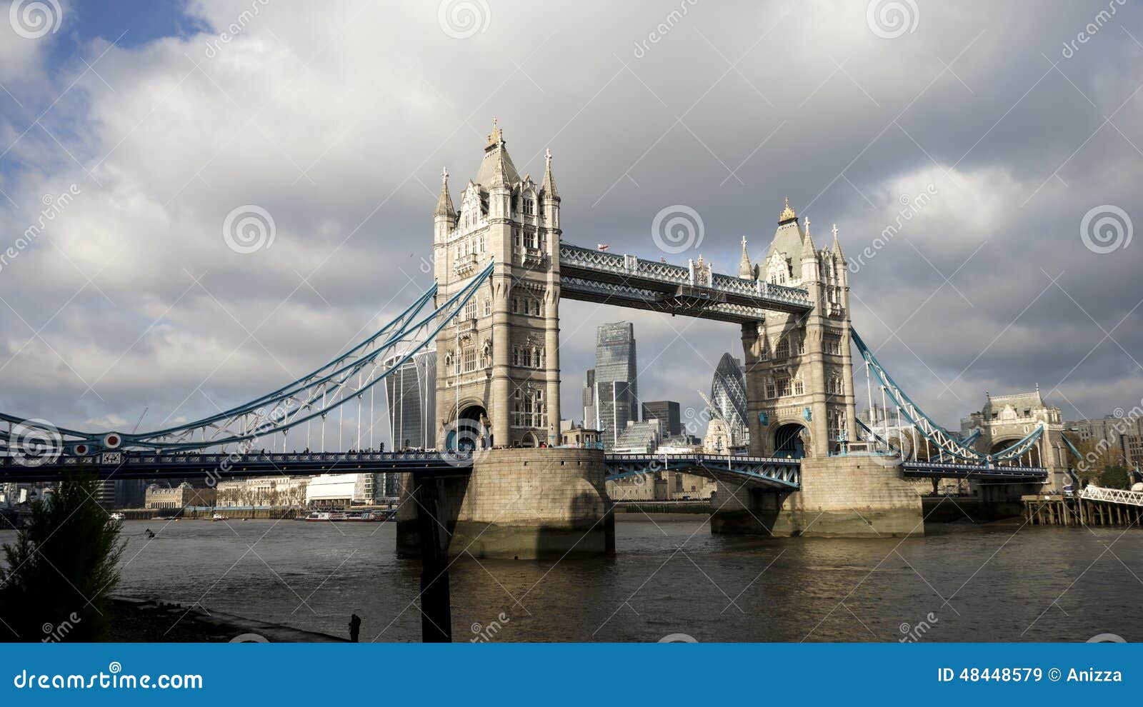 Tower Bridge in cloudy day stock image. Image of tourism - 48448579