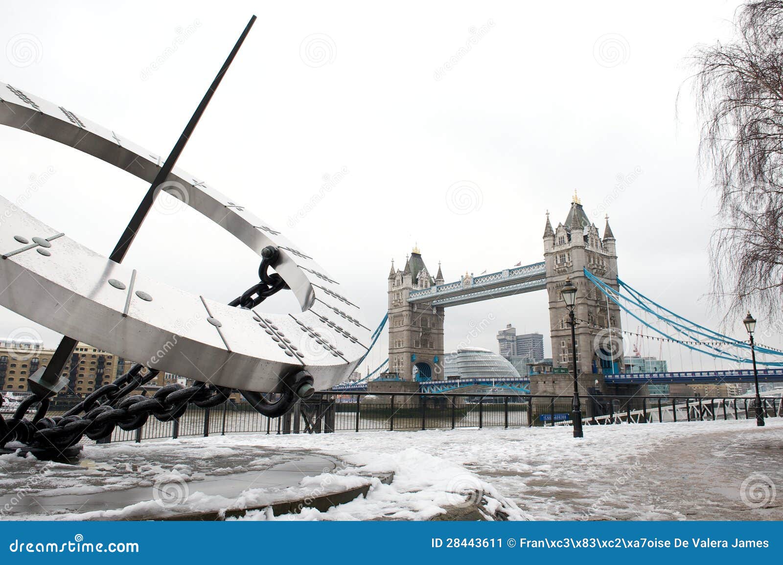 Tower Bridge and Tower Hill Dial in the Snow, London, UK Editorial ...