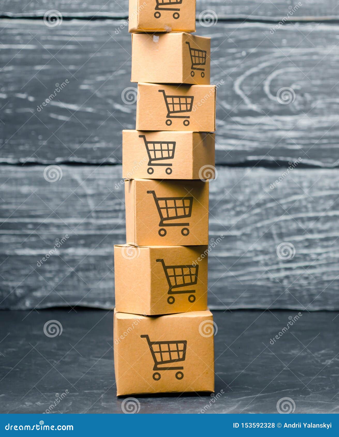 Tower of Cardboard Boxes with Pattern of Shopping Carts on a Blue ...