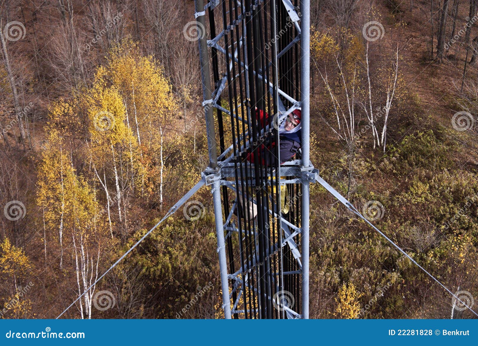 Tower Climber And Working On Cellular Tower System. Royalty-Free Stock ...