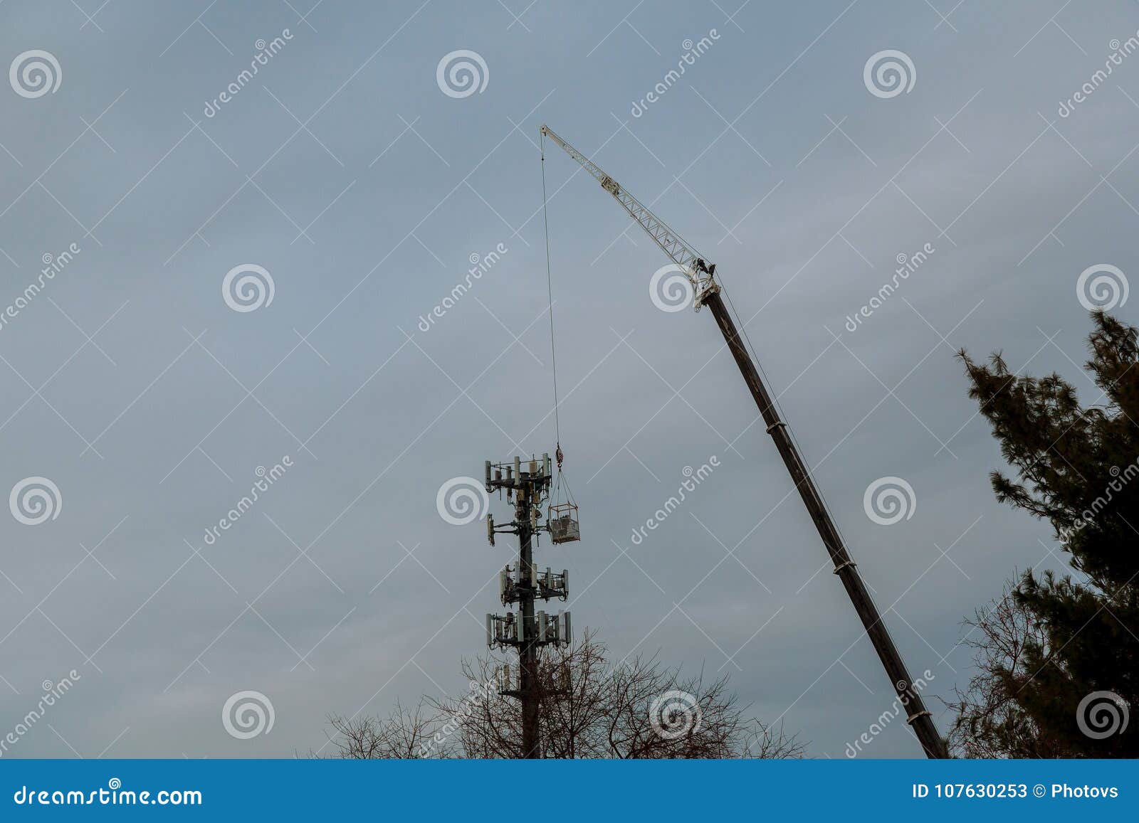 Tower Climber and Working on Cellular Tower System. Stock Image - Image ...