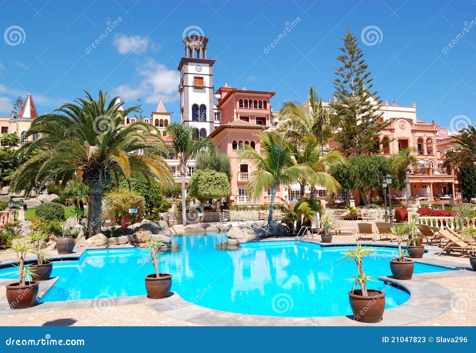 Tower with Clock and Swimming Pool Stock Image - Image of outdoor ...