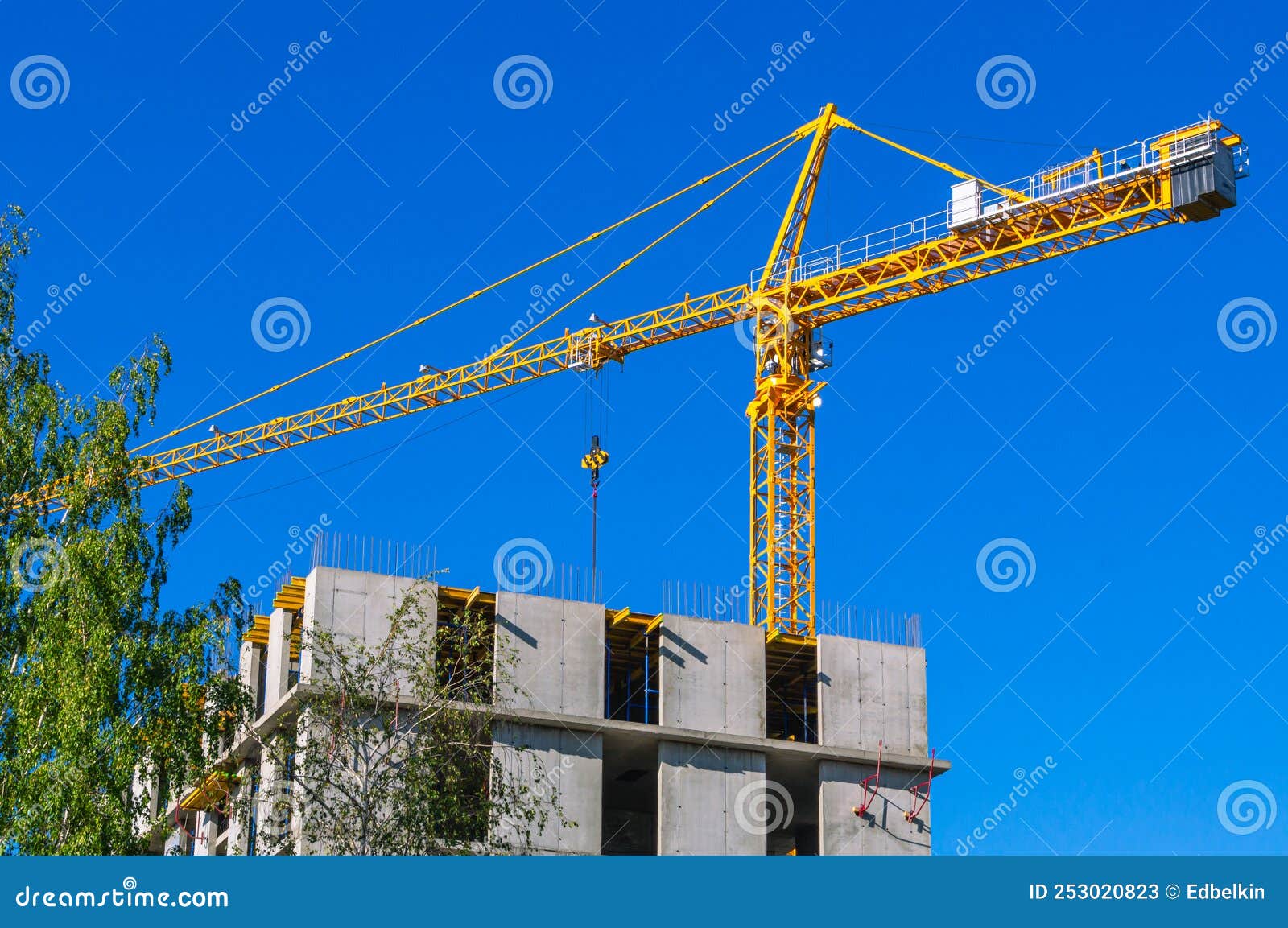 A Tower Construction Crane on the Background of a Blue Sky Stock Image ...