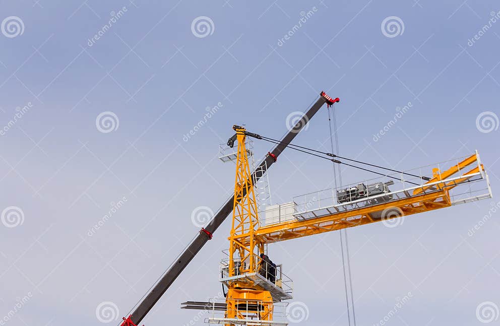 Tower Crane Assembly. Installation of a Construction Crane before ...