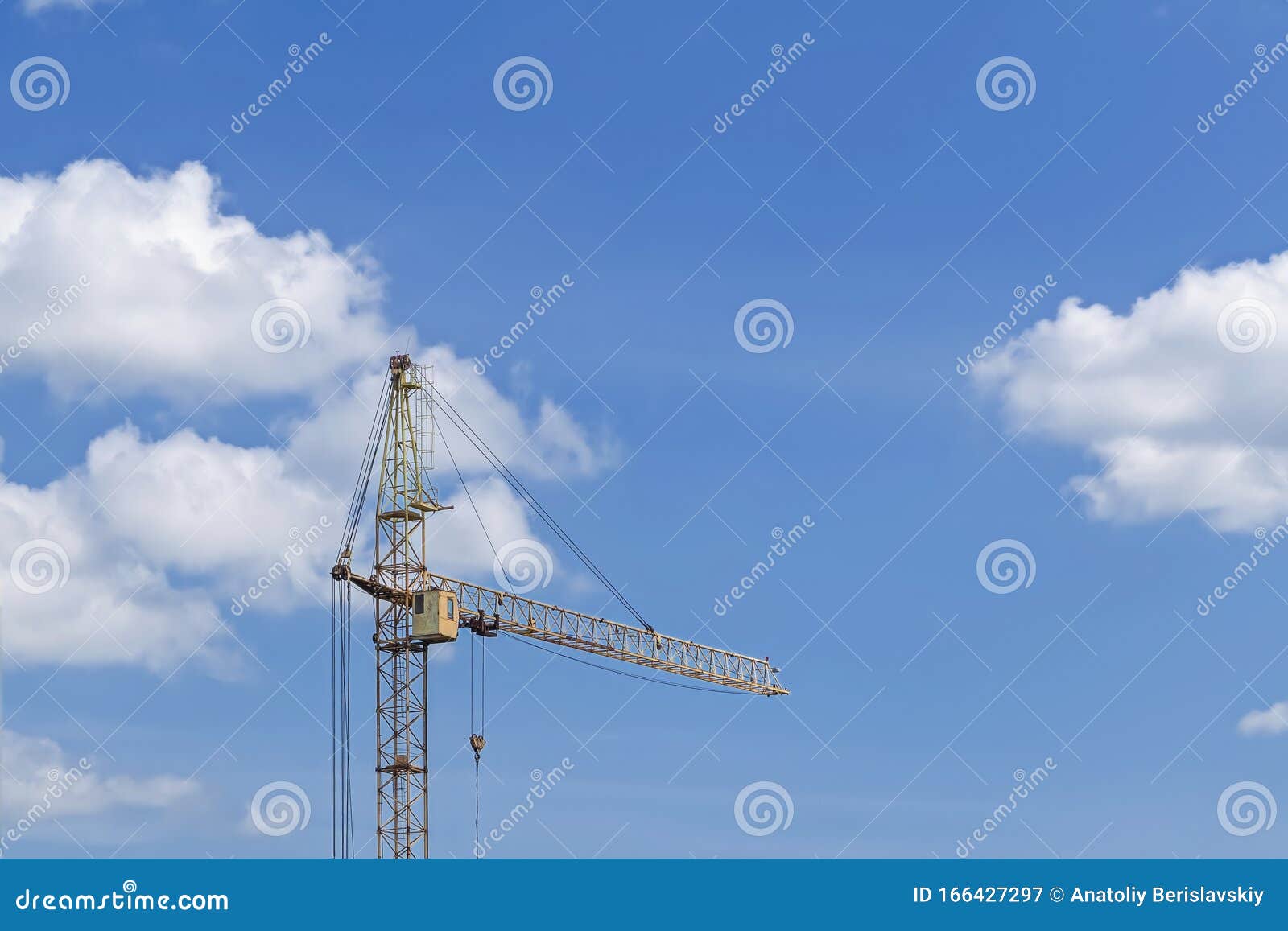 Tower Crane on a Background of Blue Sky and White Clouds Stock Image ...