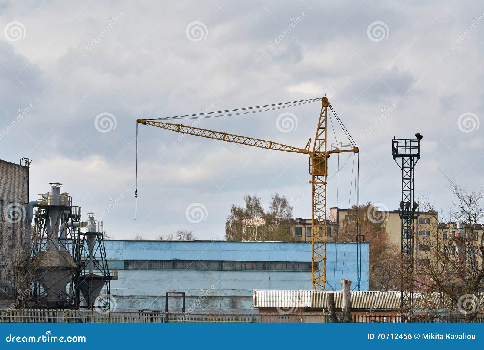 Tower Crane on a Background of Machine-building Plant Stock Photo ...