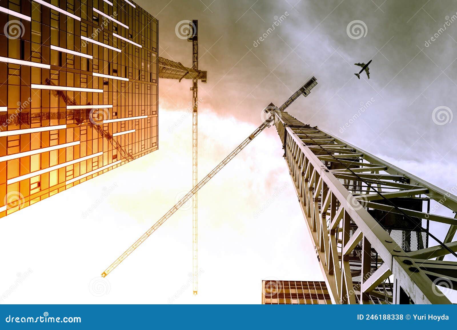 Tower Crane. Bottom View of a Tall Construction Cranes Next To a Modern ...