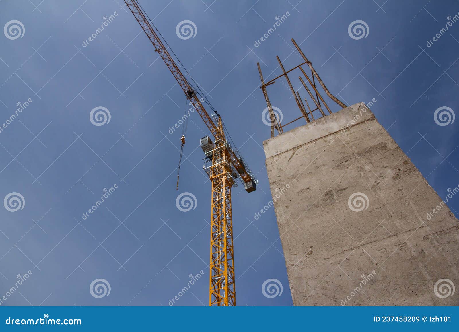 Tower Crane and Concrete Base of the Building. Construction Crane on ...