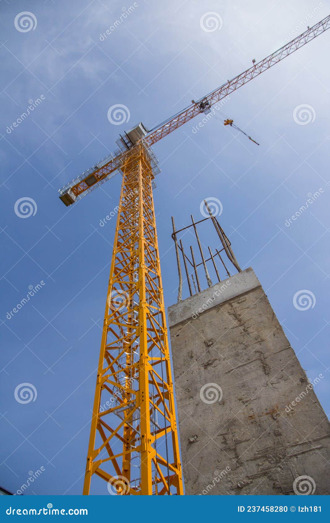 Tower Crane and Concrete Base of the Building. Construction Crane on ...