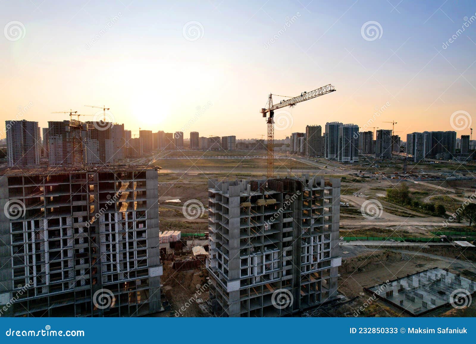 Tower Crane on Construction Site on Sunset Background. Arial View of ...
