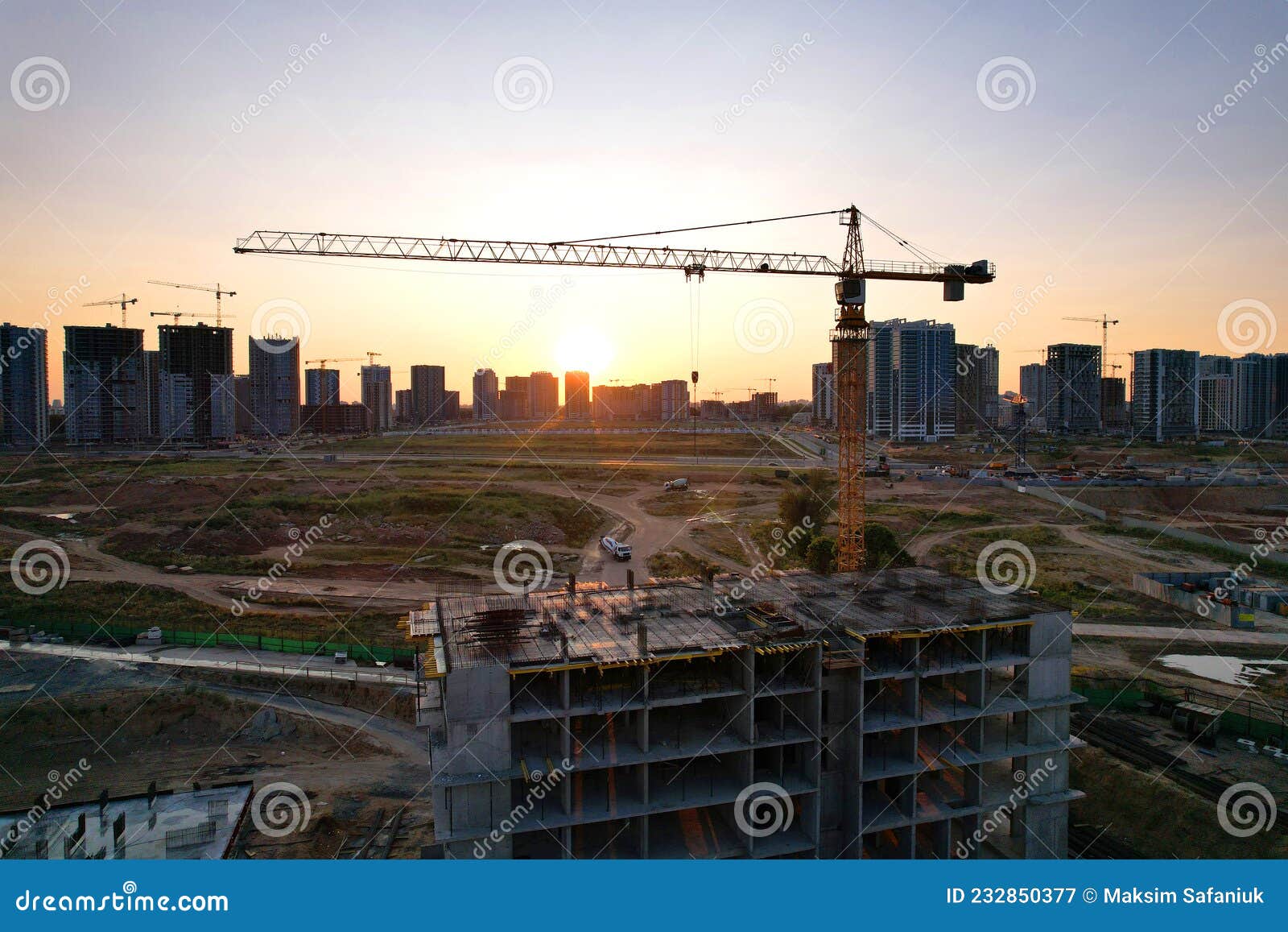 Tower Crane on Construction Site on Sunset Background. Arial View of ...