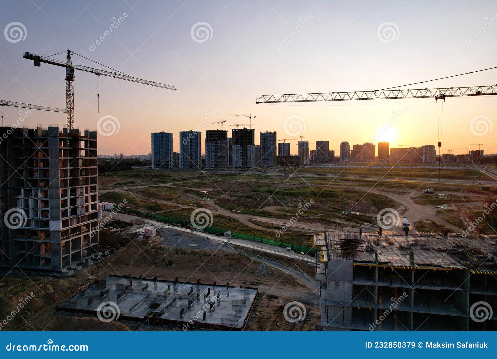 Tower Crane on Construction Site on Sunset Background. Arial View of ...