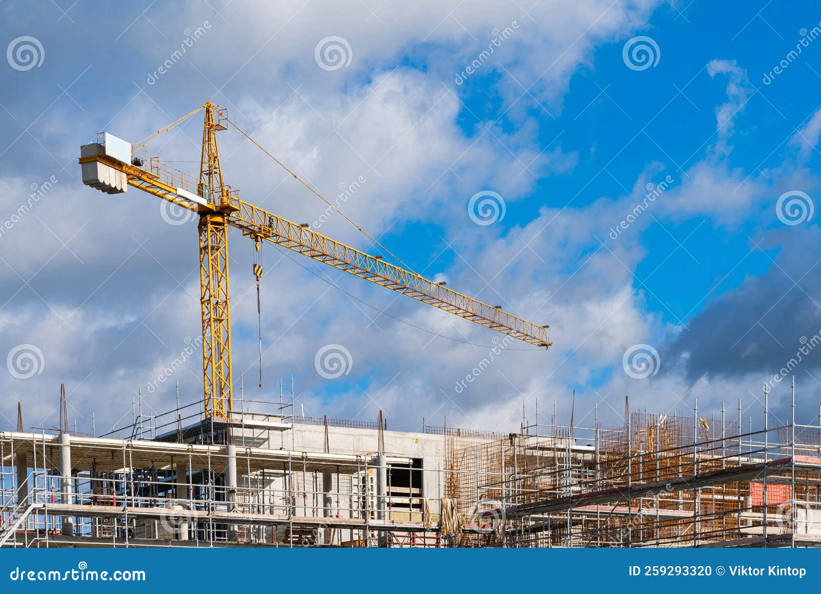 Tower Crane Over Building Under Construction in Scaffolding Stock Photo ...